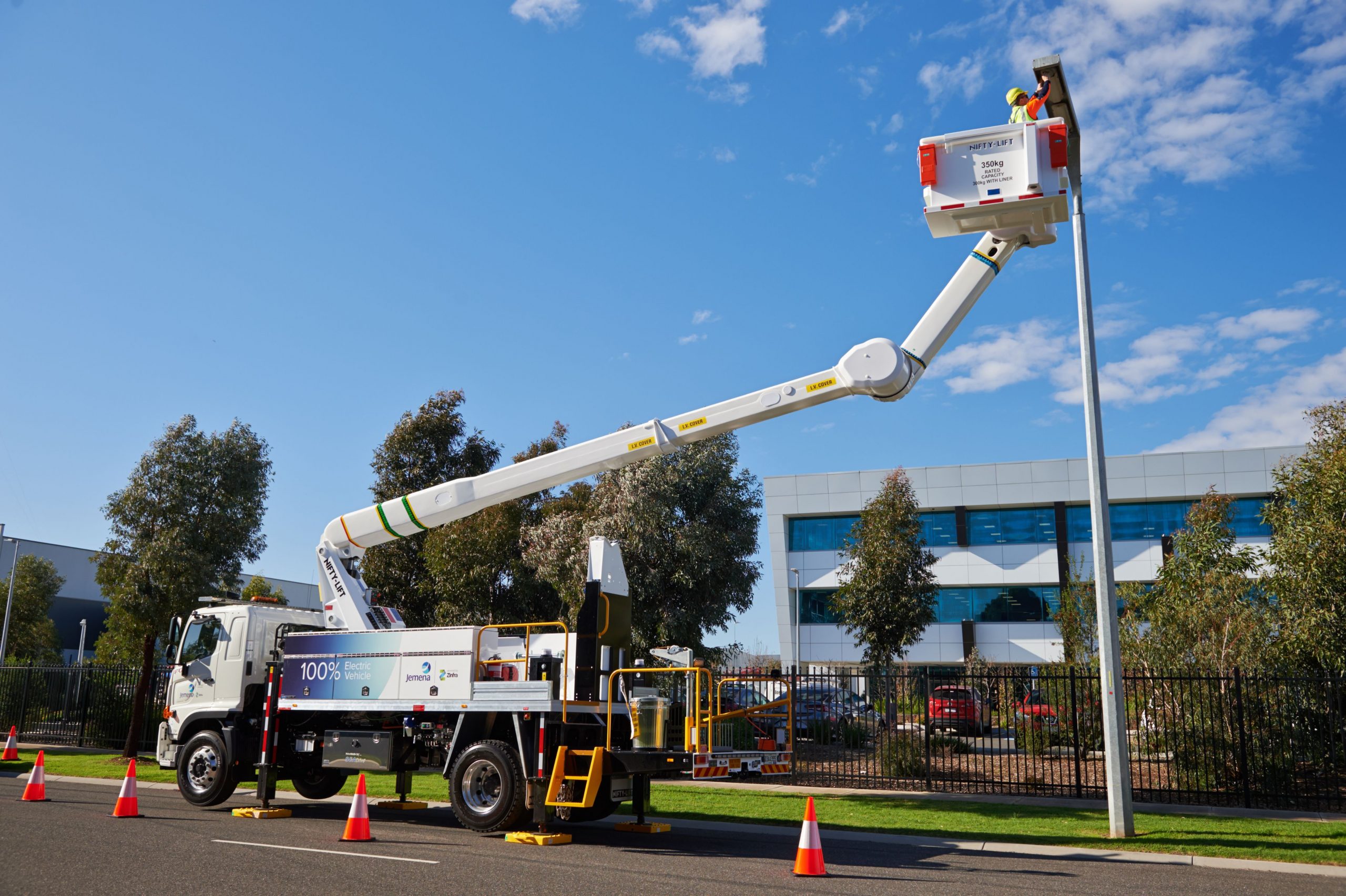 Jemena cuts emissions with electric cherry picker | iQ Industry Queensland